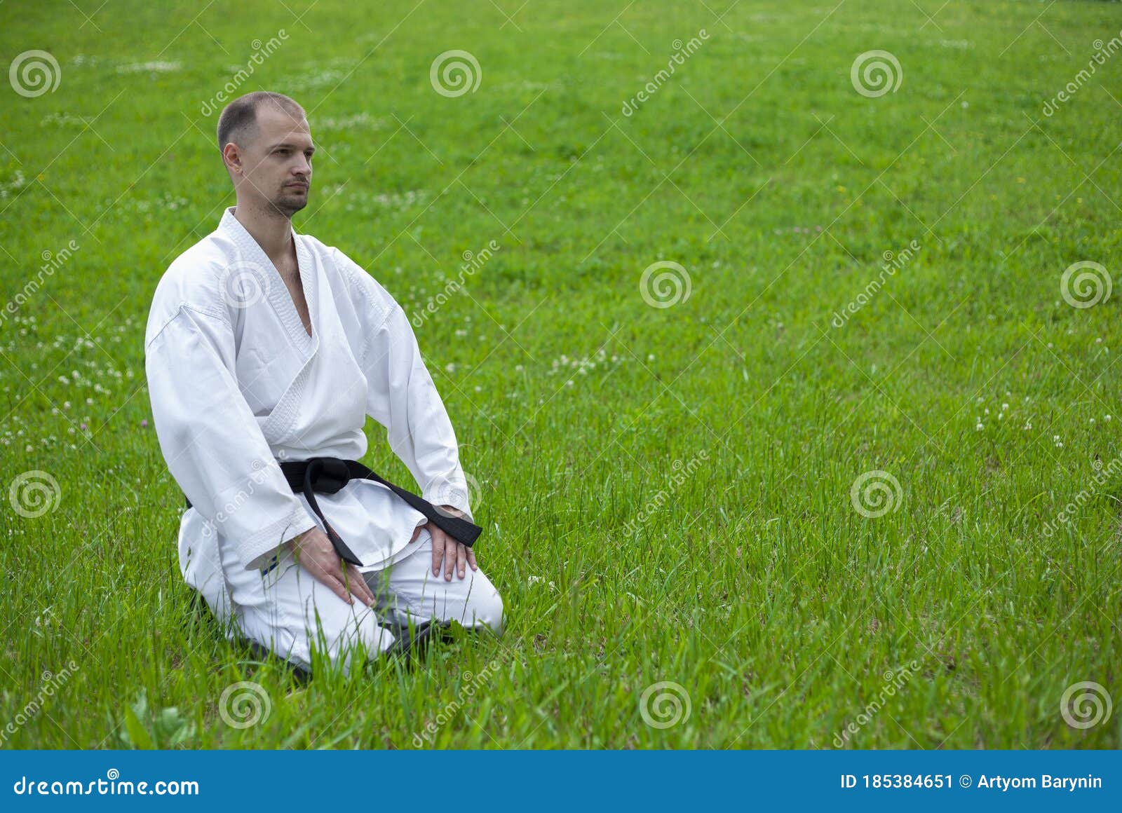 Karate Trainer is Sitting in a Pose for Meditation. Analysis of the ...