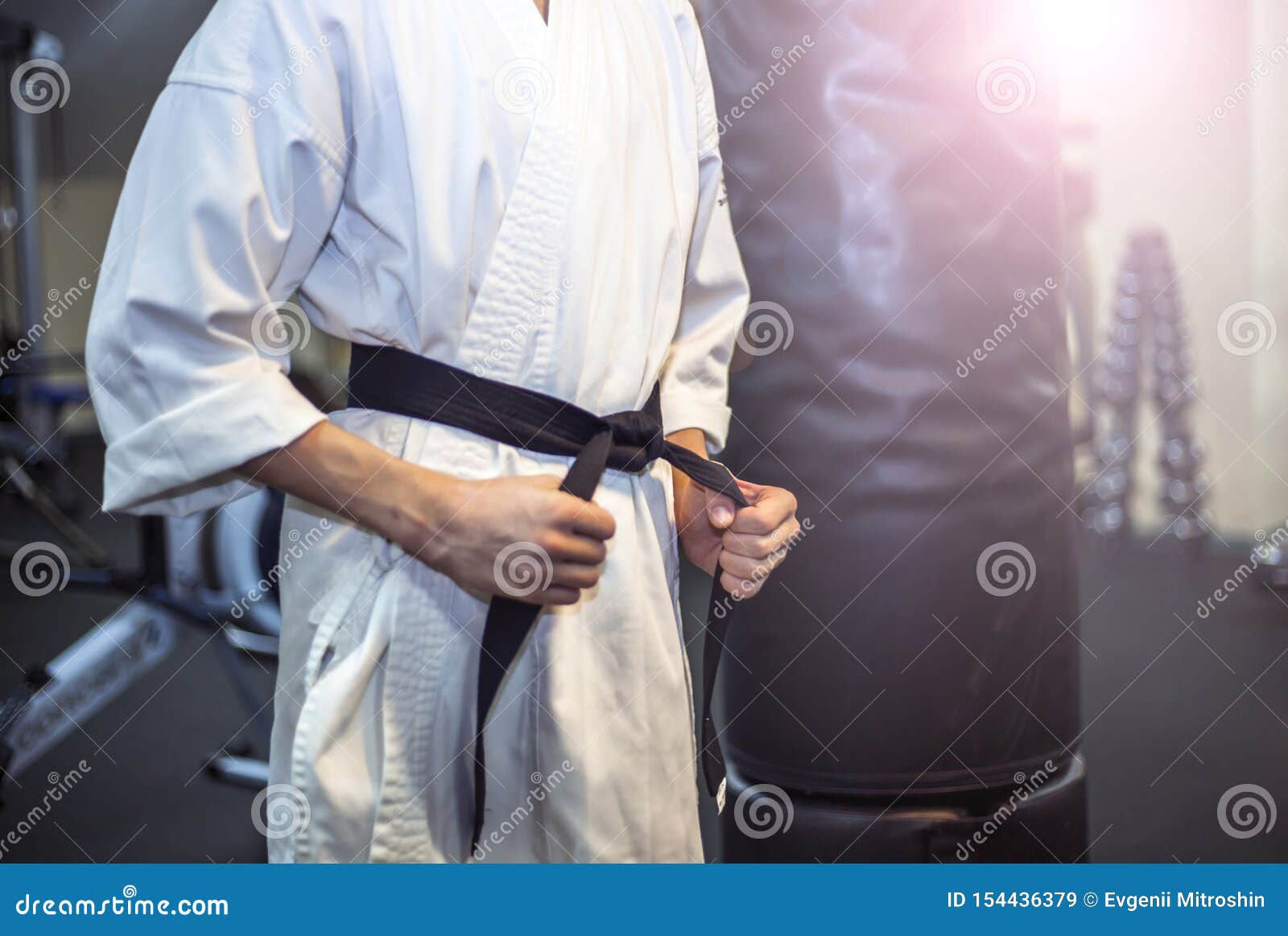 Karate. a Young Man is Practicing Kicking, Training in the Gym Stock ...