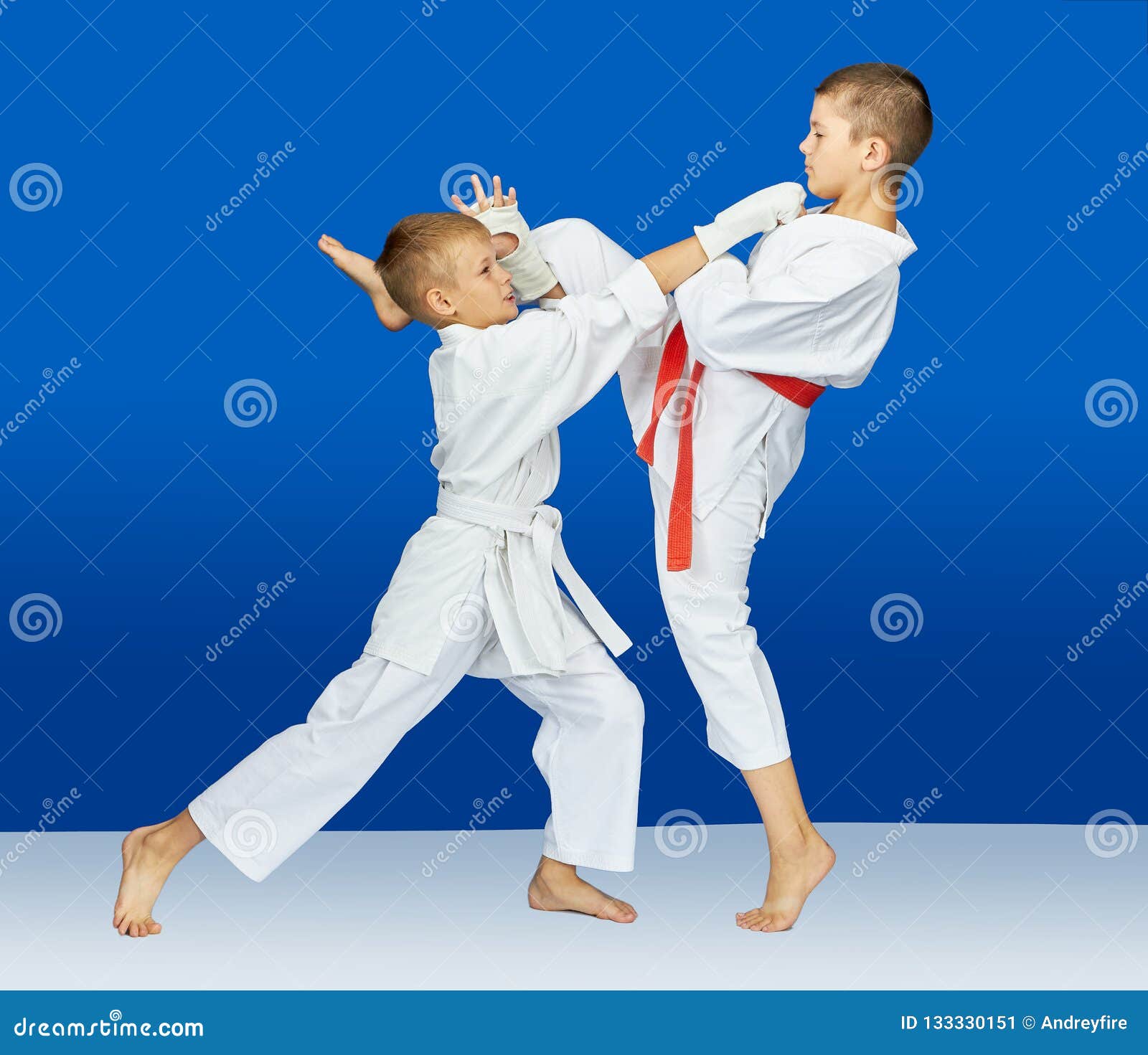 In Karategi Athletes Sit In A Karate Pose Stock Image | CartoonDealer ...