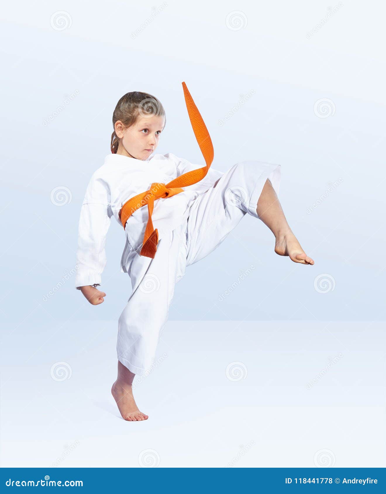 Karateka Girl Beats a Kick Leg Forward Stock Photo - Image of security ...