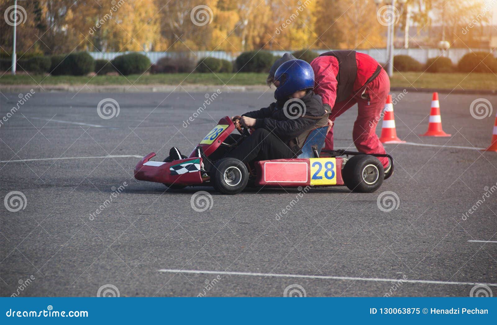 Karting Competition, the Participant Pushes the Young Man in Karting ...