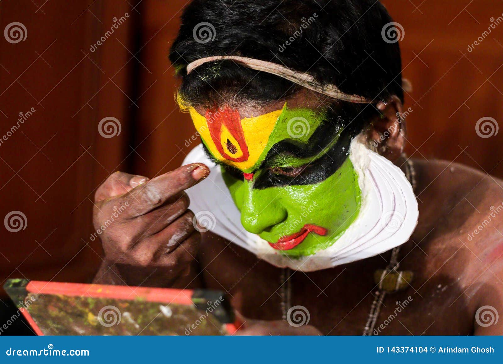 Katakhali Dance Performer Doing Face Paint and Makeup in Front of Hand ...