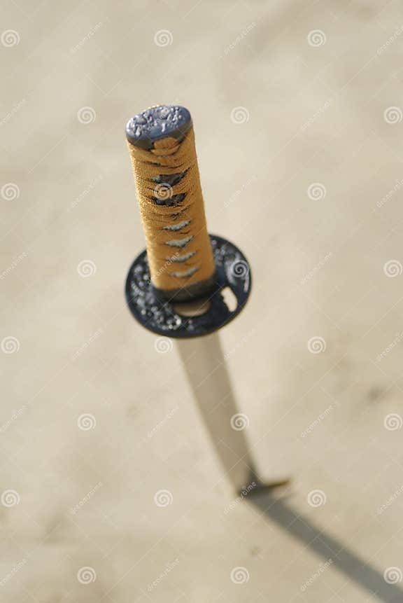 Katana stab above the sand stock photo. Image of samurai - 14273762