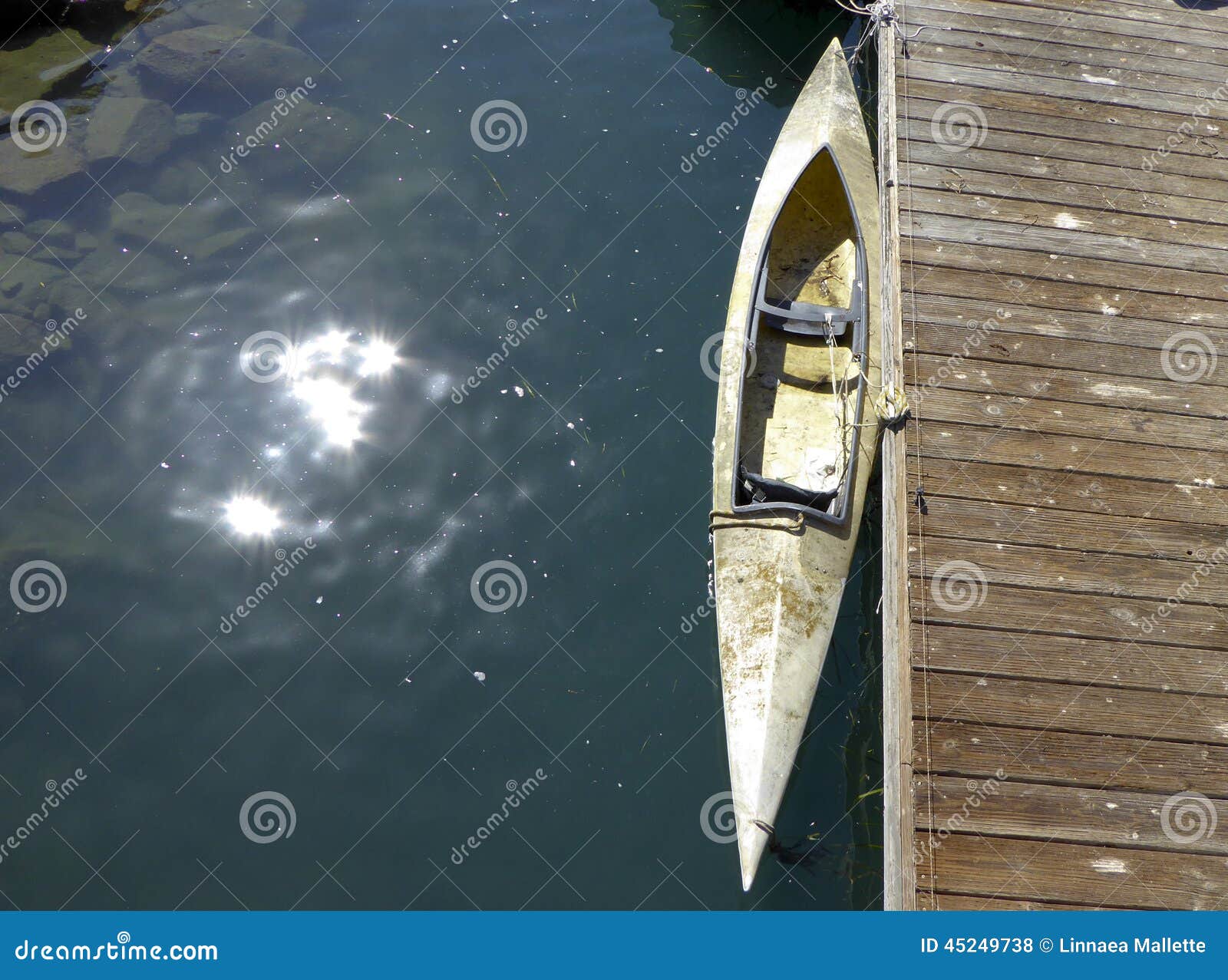 Old Kayak docked at pier stock photo. Image of play, sport - 45249738