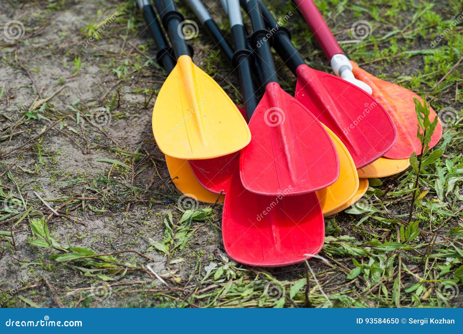 Kayak Oars and Paddles on the River Bank Stock Photo - Image of beach ...