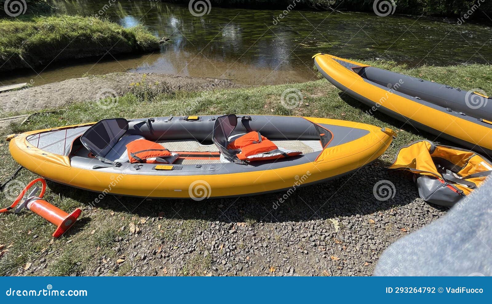 A Kayak on the Riverbank, a Rubber Two-seater Boat Preparing for River ...