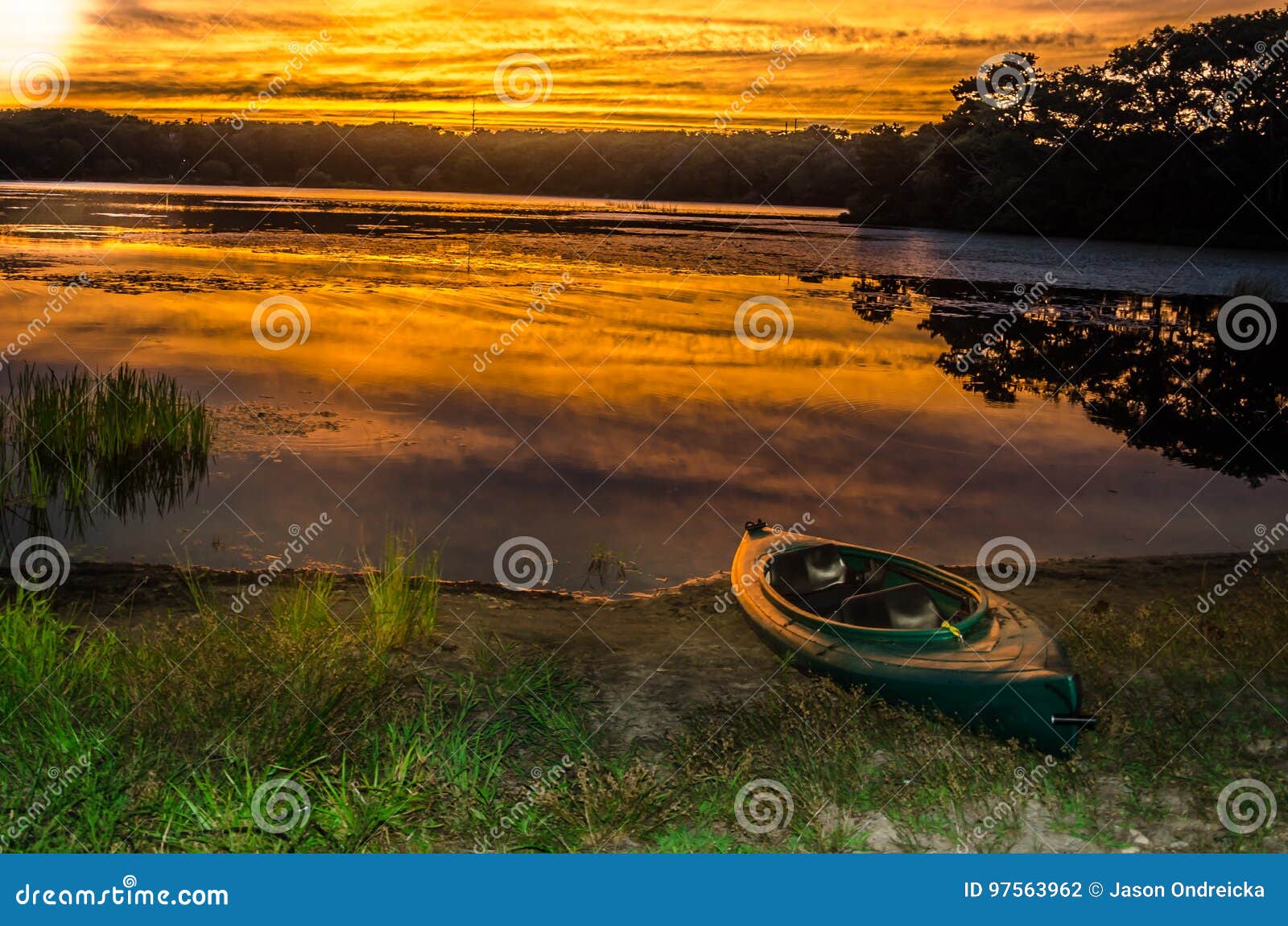 Kayak at Sunset stock photo. Image of boating, activities - 97563962