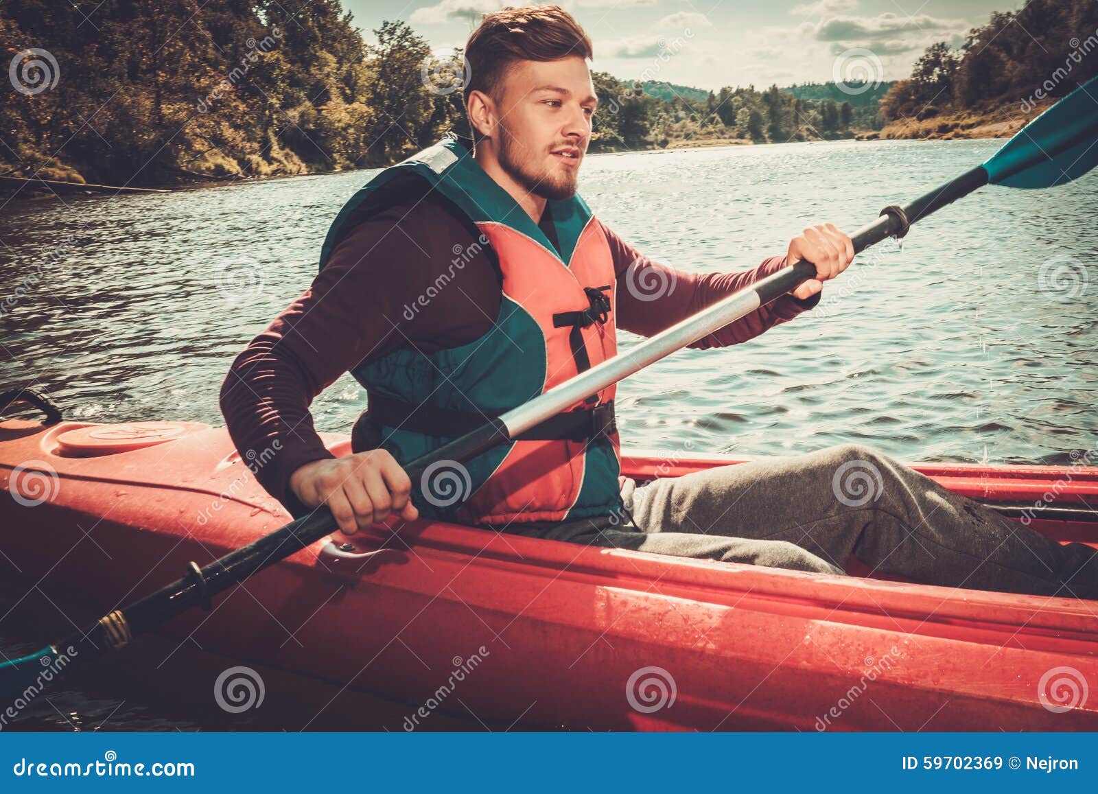 Kayaker on a boat stock image. Image of jacket, activity - 59702369