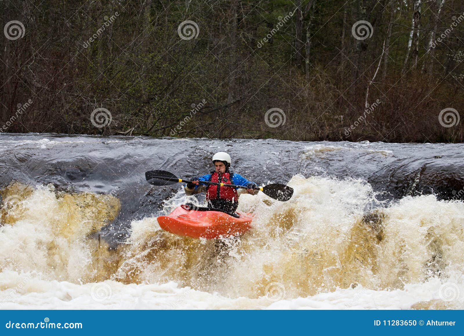Kayaker over a waterfall stock photo. Image of surf, adult - 11283650