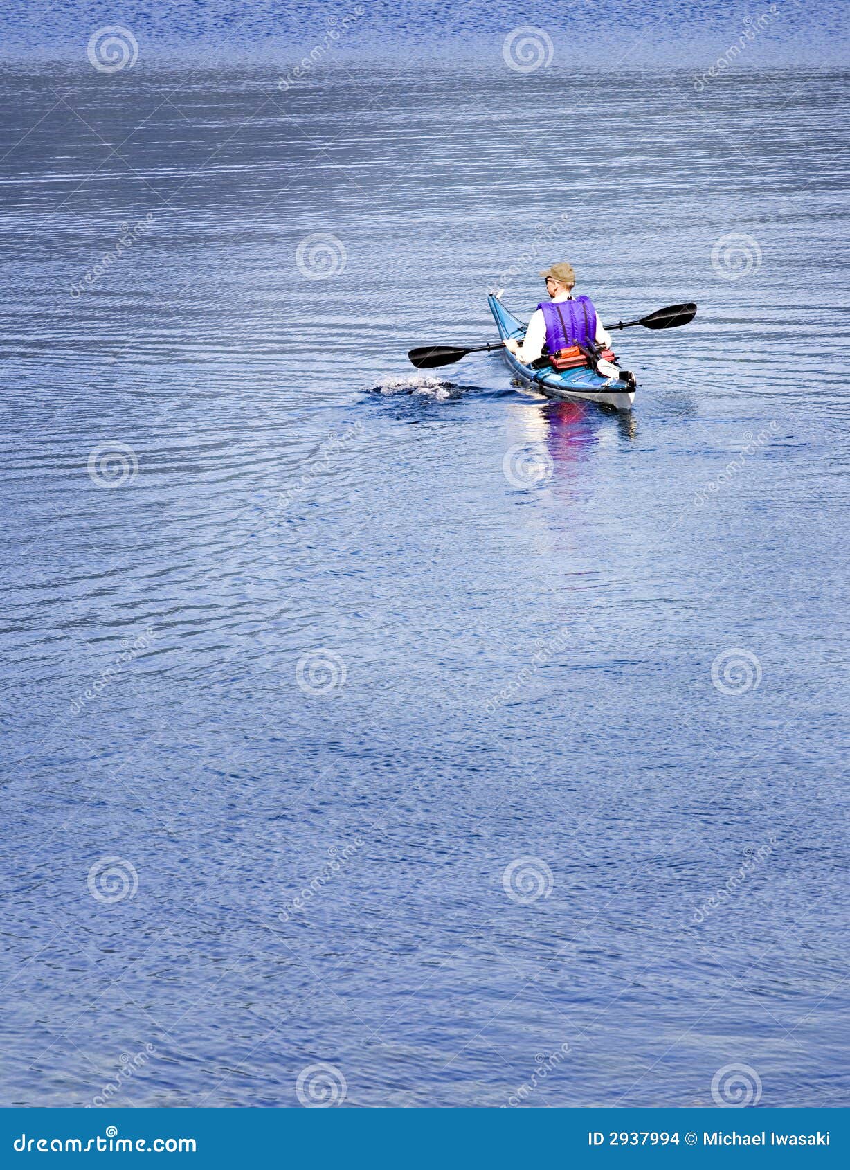 Kayaker paddling on lake stock photo. Image of paddling - 2937994
