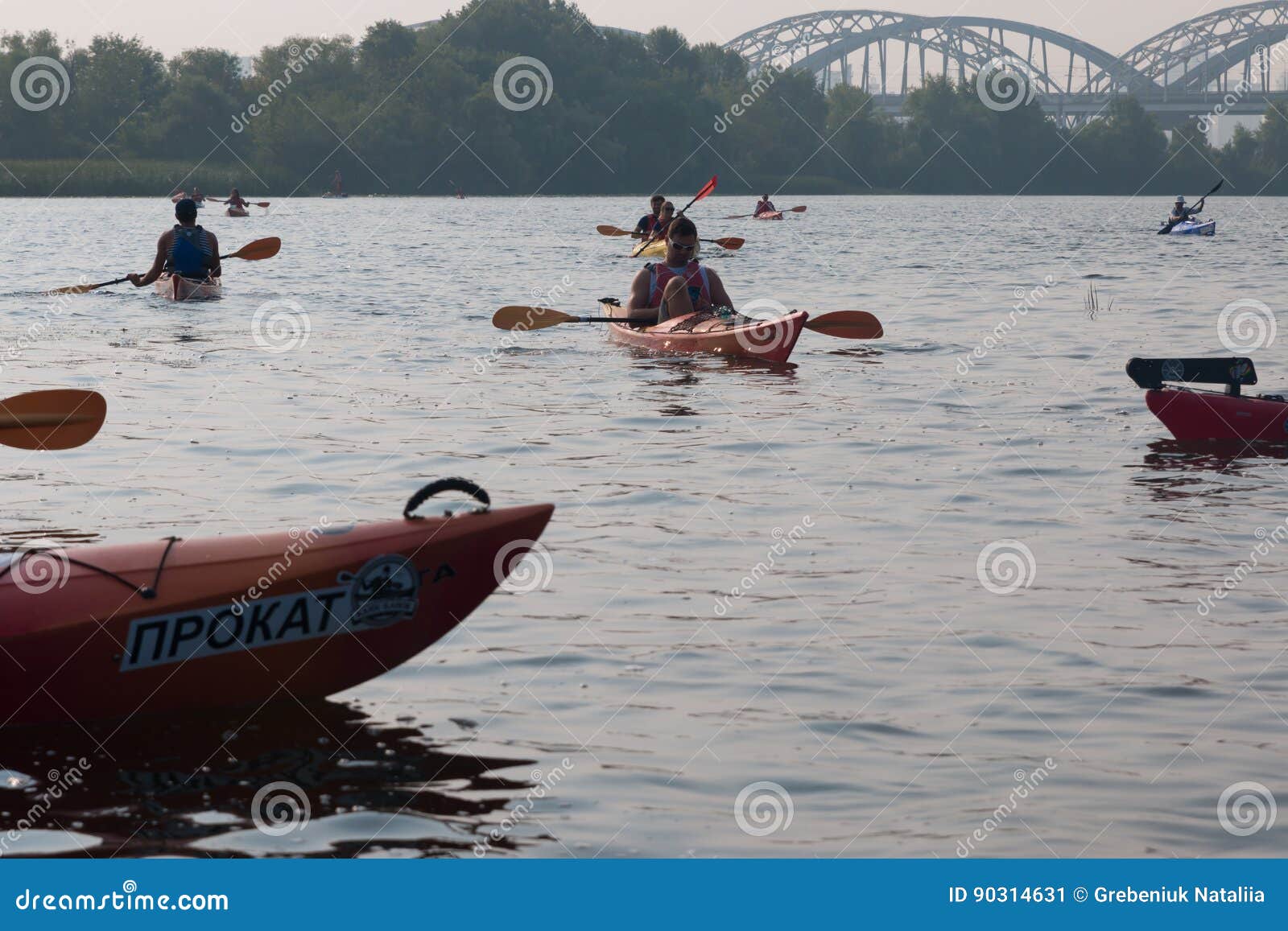 Kayakers on the River Near the Bridge Editorial Photo - Image of flag ...