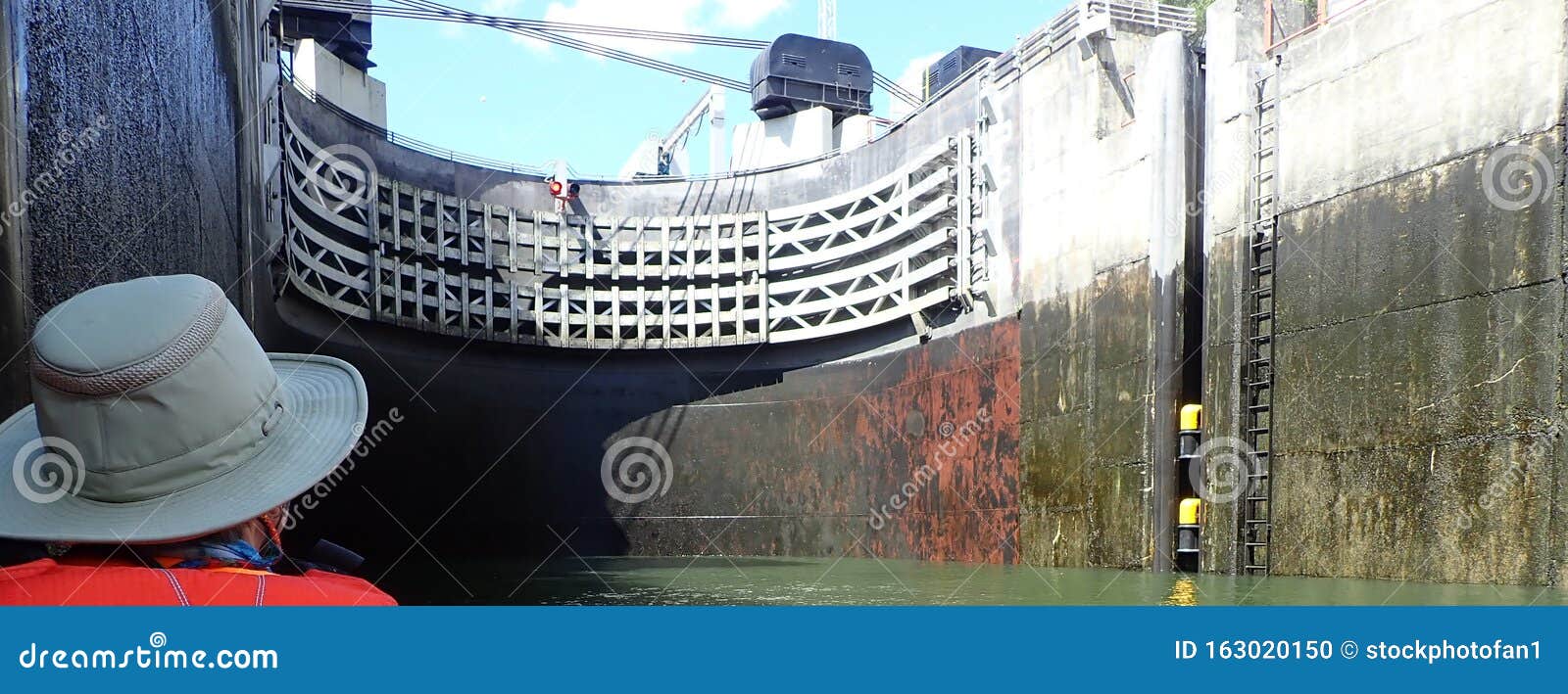 Kayaking in a Kayak in a River with Large Boat Lock Stock Photo - Image ...
