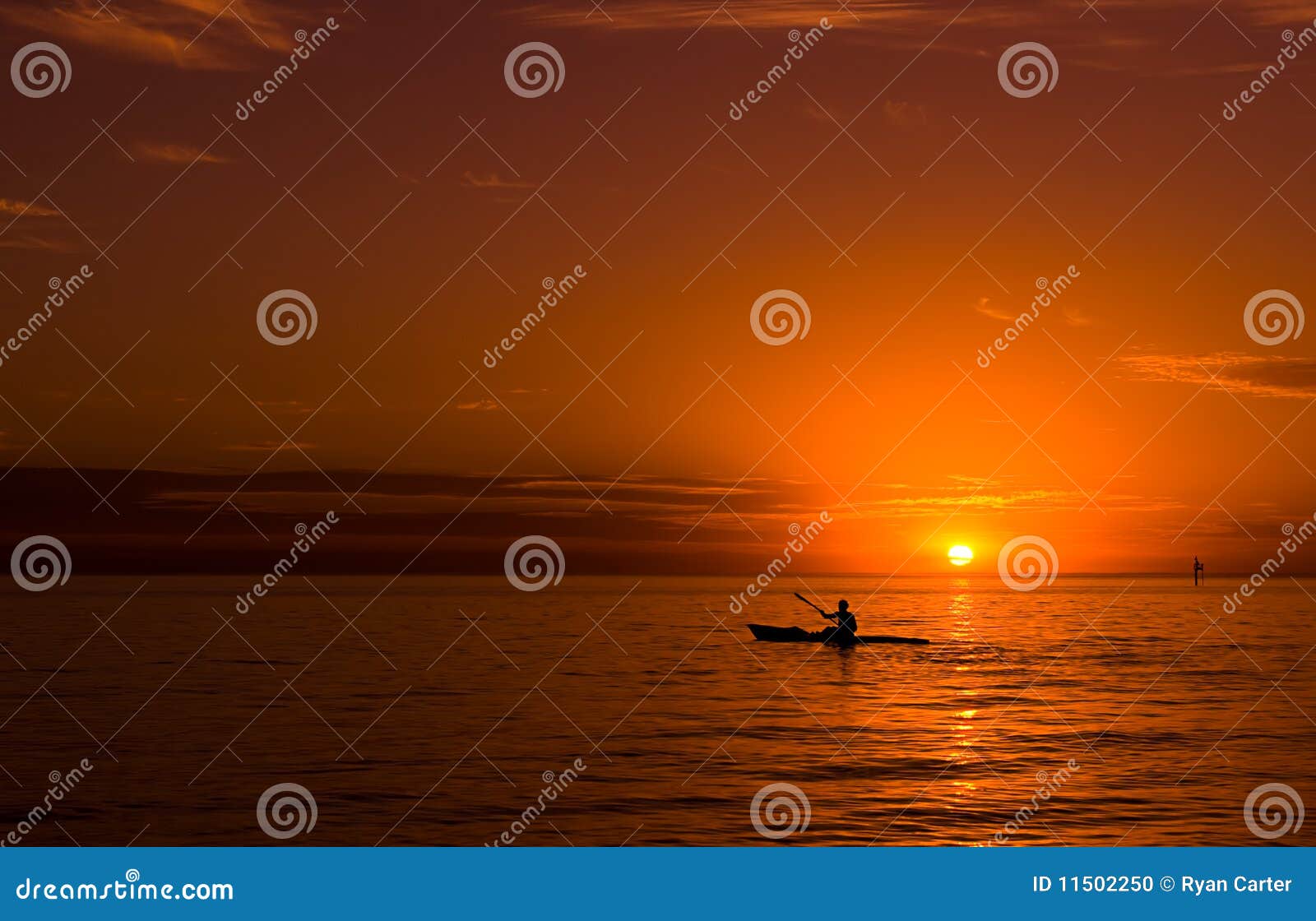 Kayaking at sunset stock photo. Image of sport, people - 11502250