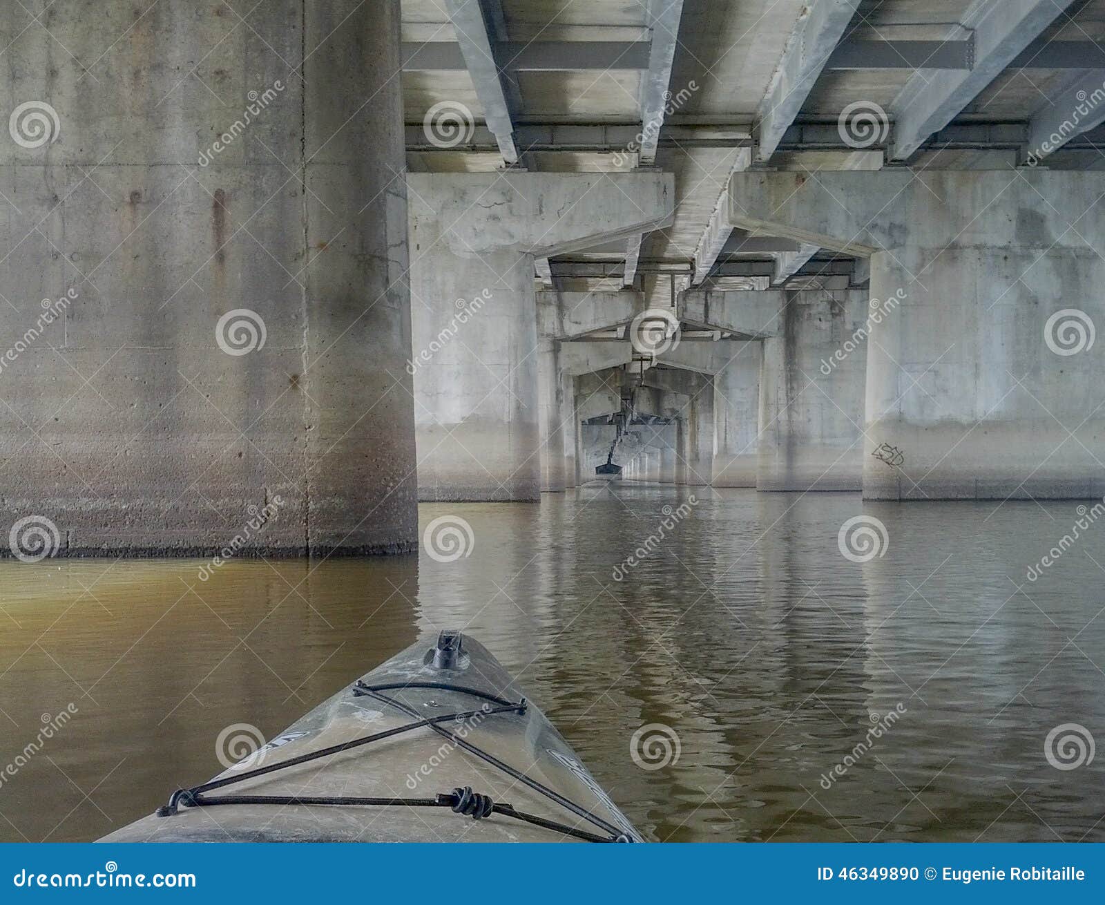 Kayaking under the bridge stock photo. Image of september - 46349890