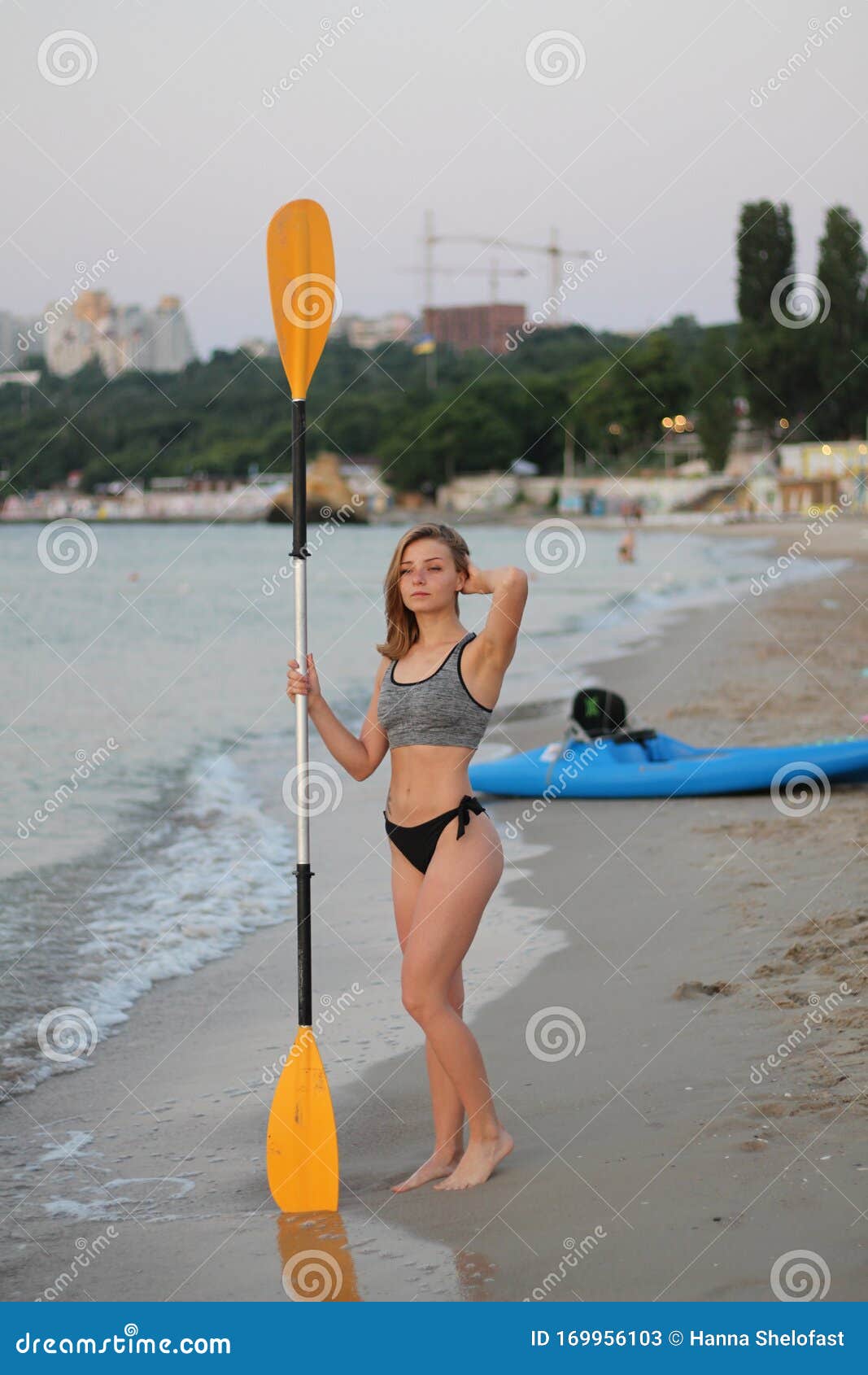 Kayaking Woman In Kayak Girl Rowing In The Water Of A Calm Sea Stock