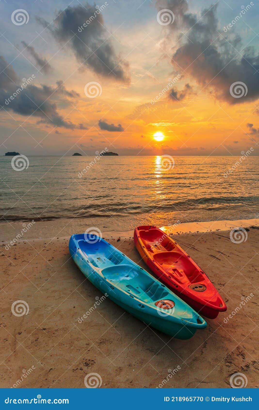 Kayaks at sunset stock photo. Image of beautiful, leisure - 218965770