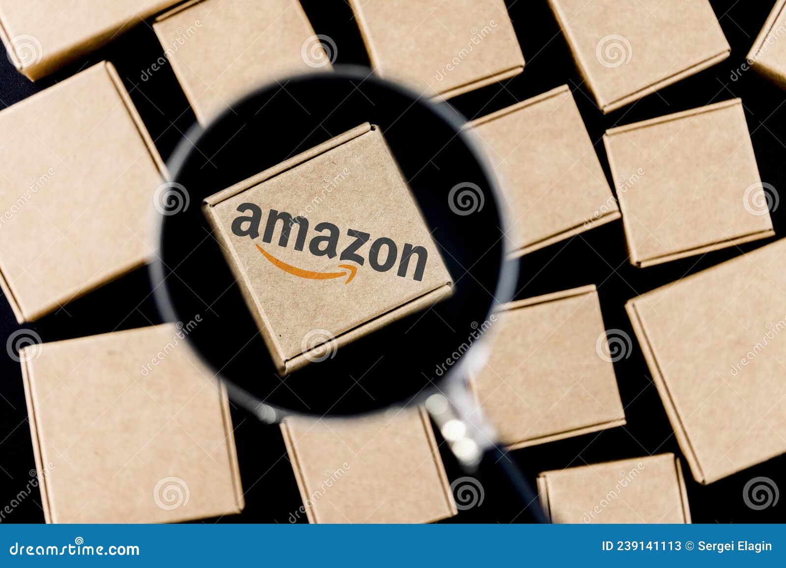 Modified Photo of Amazon Logo on a Box Under a Magnifying Glass ...