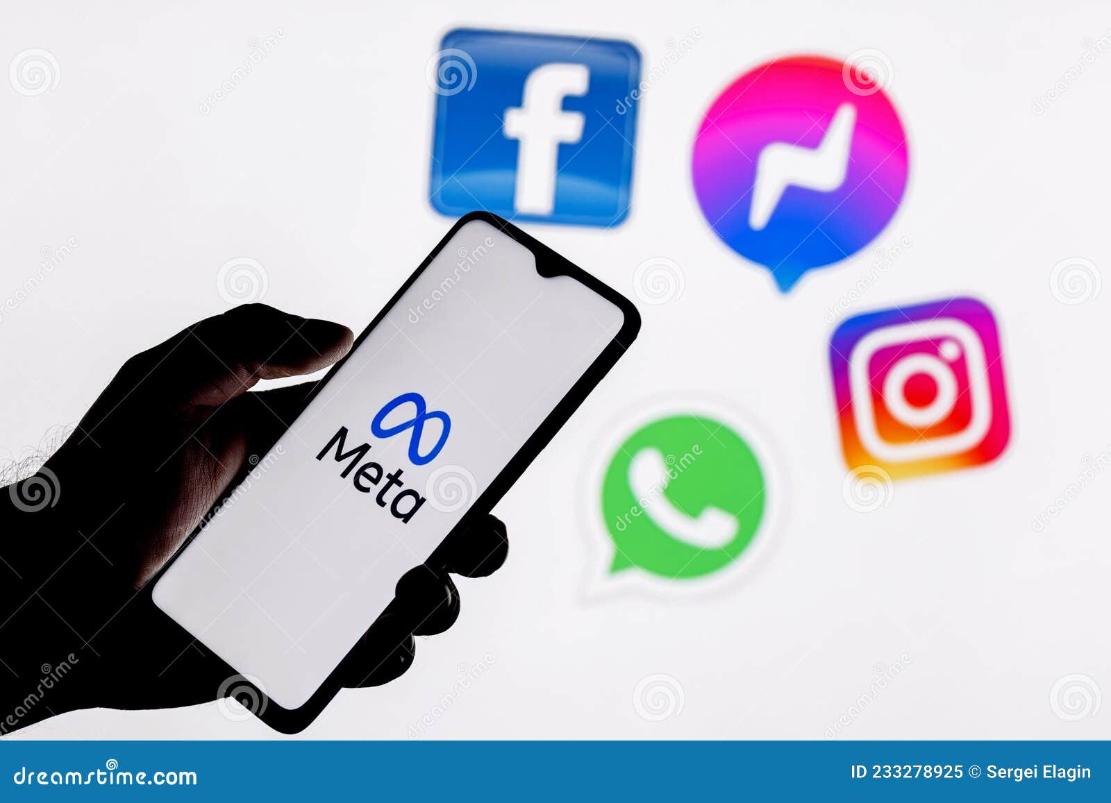 Facebook Changes Its Name To Meta. Smartphone with Meta Logo on the ... Facebook Changes Its Name To Meta. Smartphone with Meta Logo on the ...