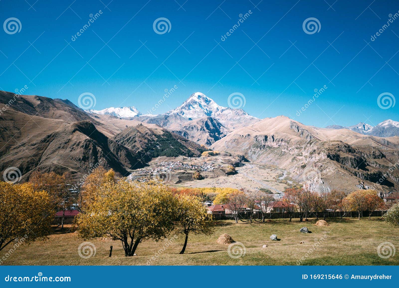 A View of Kazbegi in Georgia Stock Photo - Image of khazbegi, hills ...
