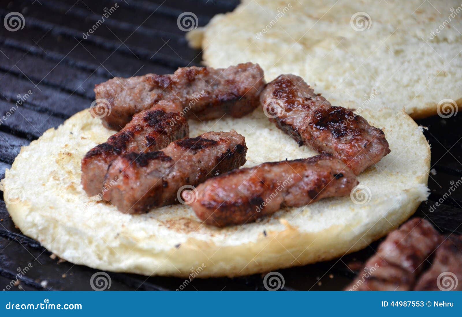 Kebabs on a bread on grill stock image. Image of bread - 44987553
