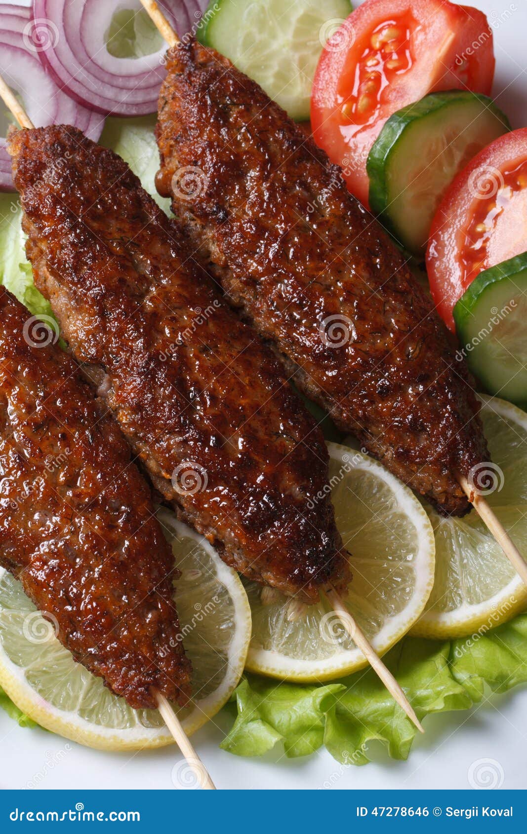 Kebabs with Vegetables Close-up. Vertical Top View Stock Photo - Image ...