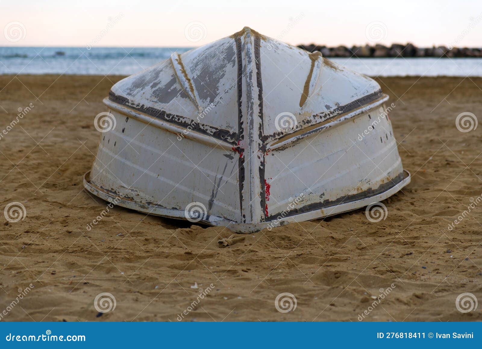 The Keel of a Small Boat Capsized on the Beach Stock Image - Image of ...