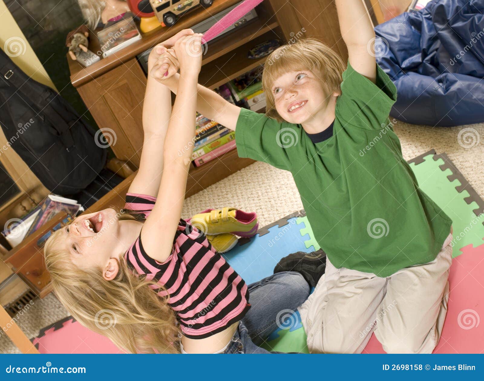 Keep-away! stock photo. Image of bedhead, daughter, friendliness - 2698158