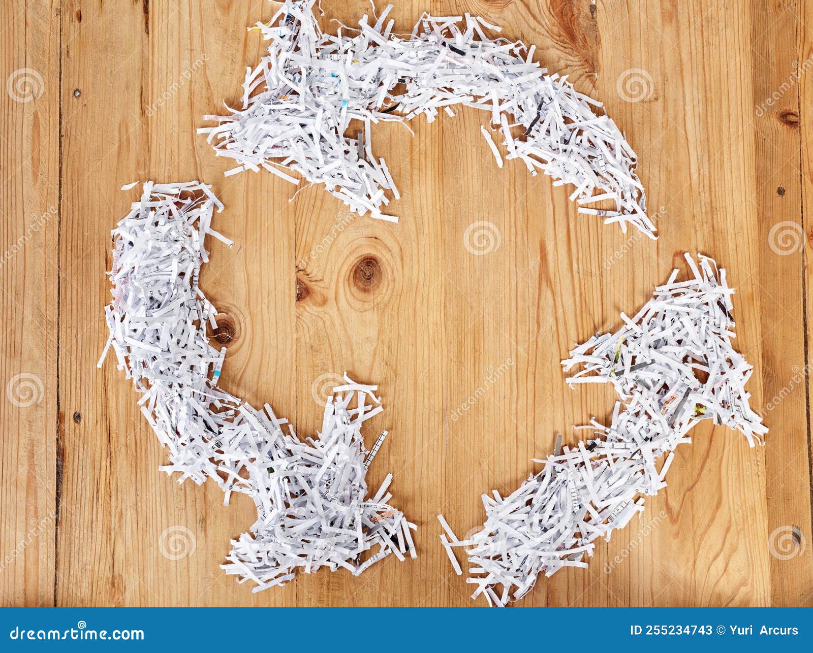 Keep the Cycle Going. Studio Shot of Shredded Paper Forming a Recycling ...