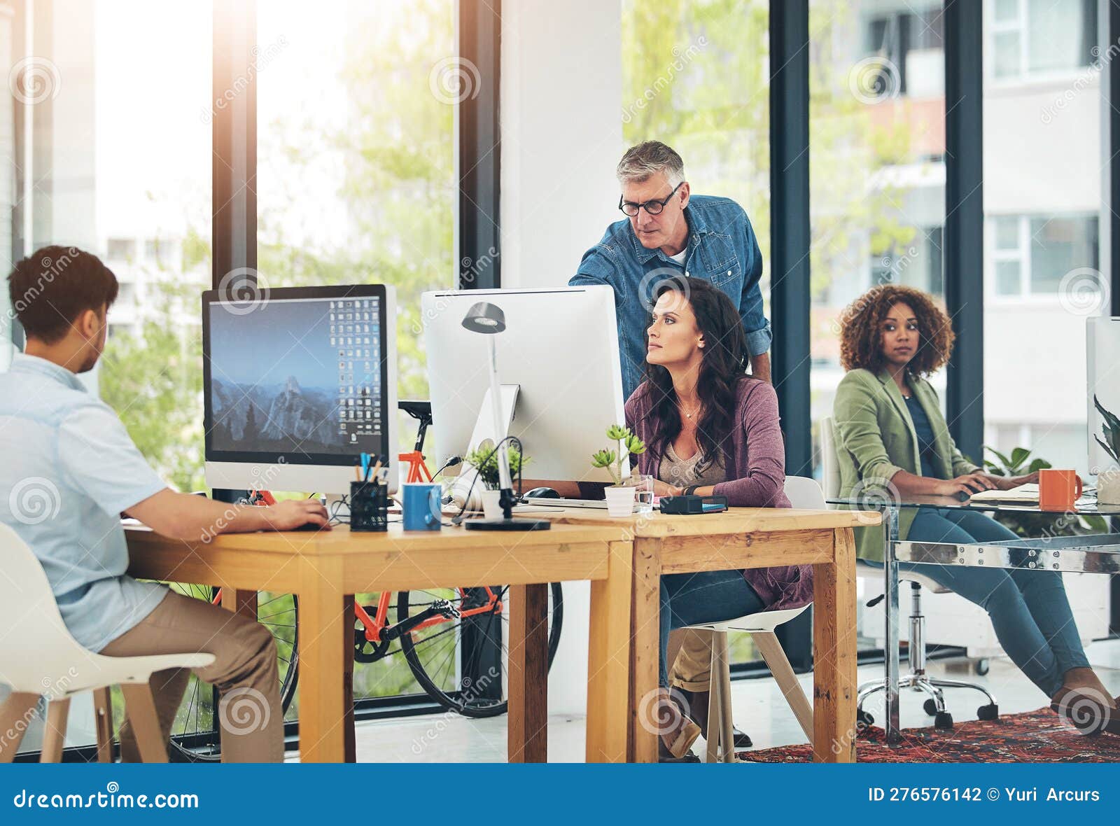 Keep an Eye on this Section. Group of Creative Colleagues Working on a ...