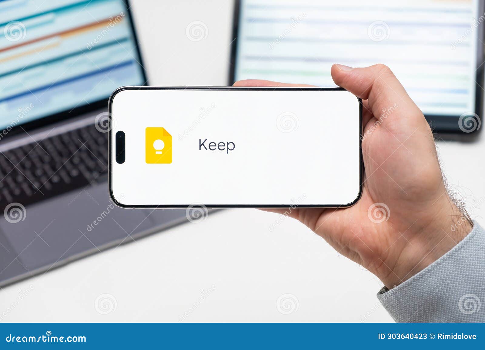 Keep Logo of App on the Screen of Mobile Phone Held by Man in Front of ...