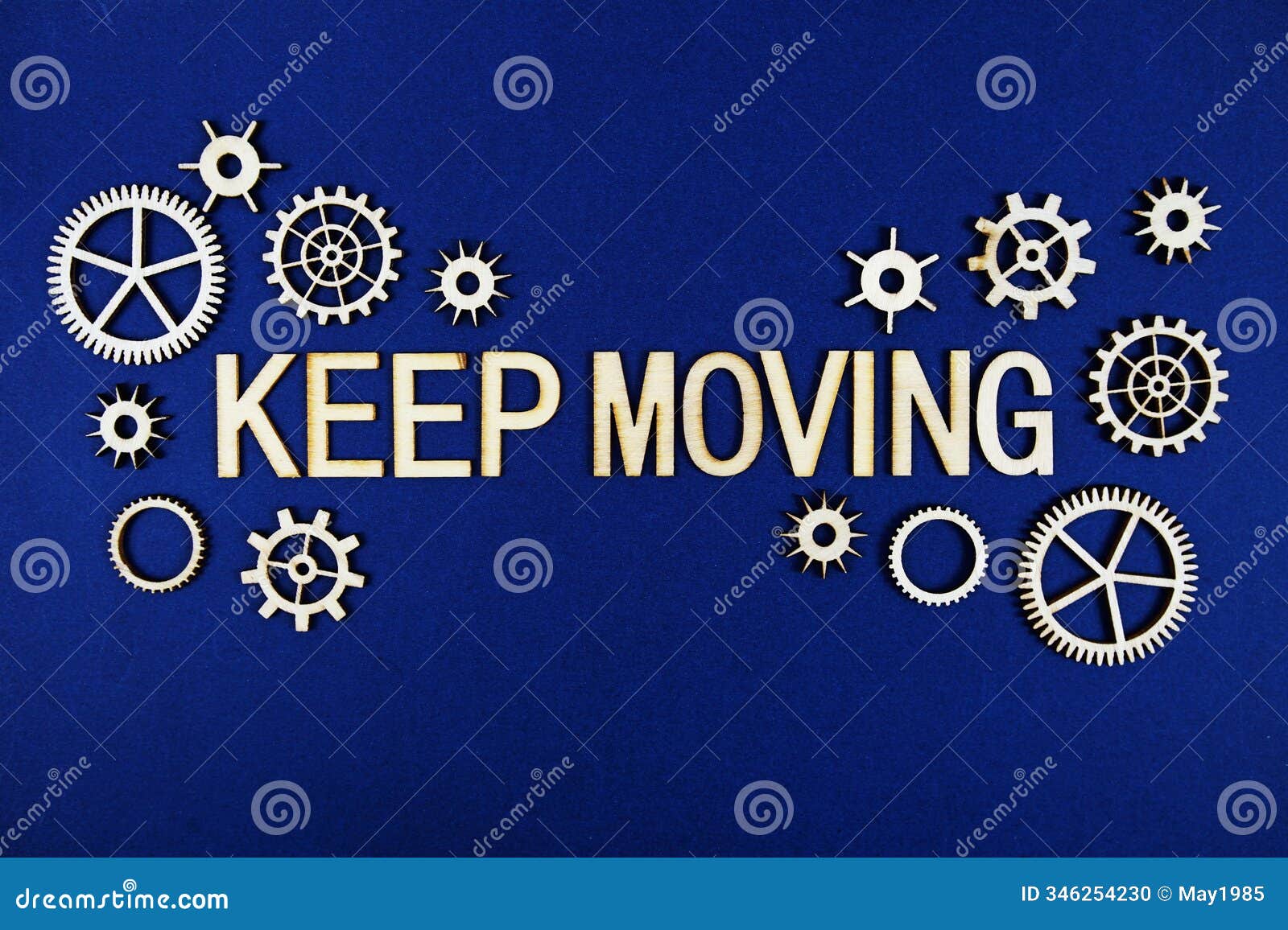 Keep Moving Alphabet Letters with Gears Element on Navy Blue Background ...