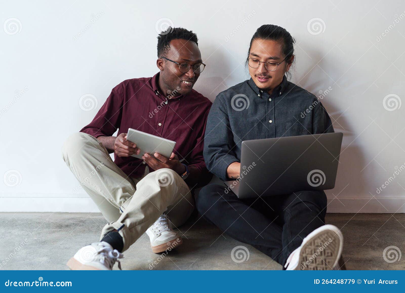 We always Keep Ourselves in the Loop. Full Length Shot of Two Young ...