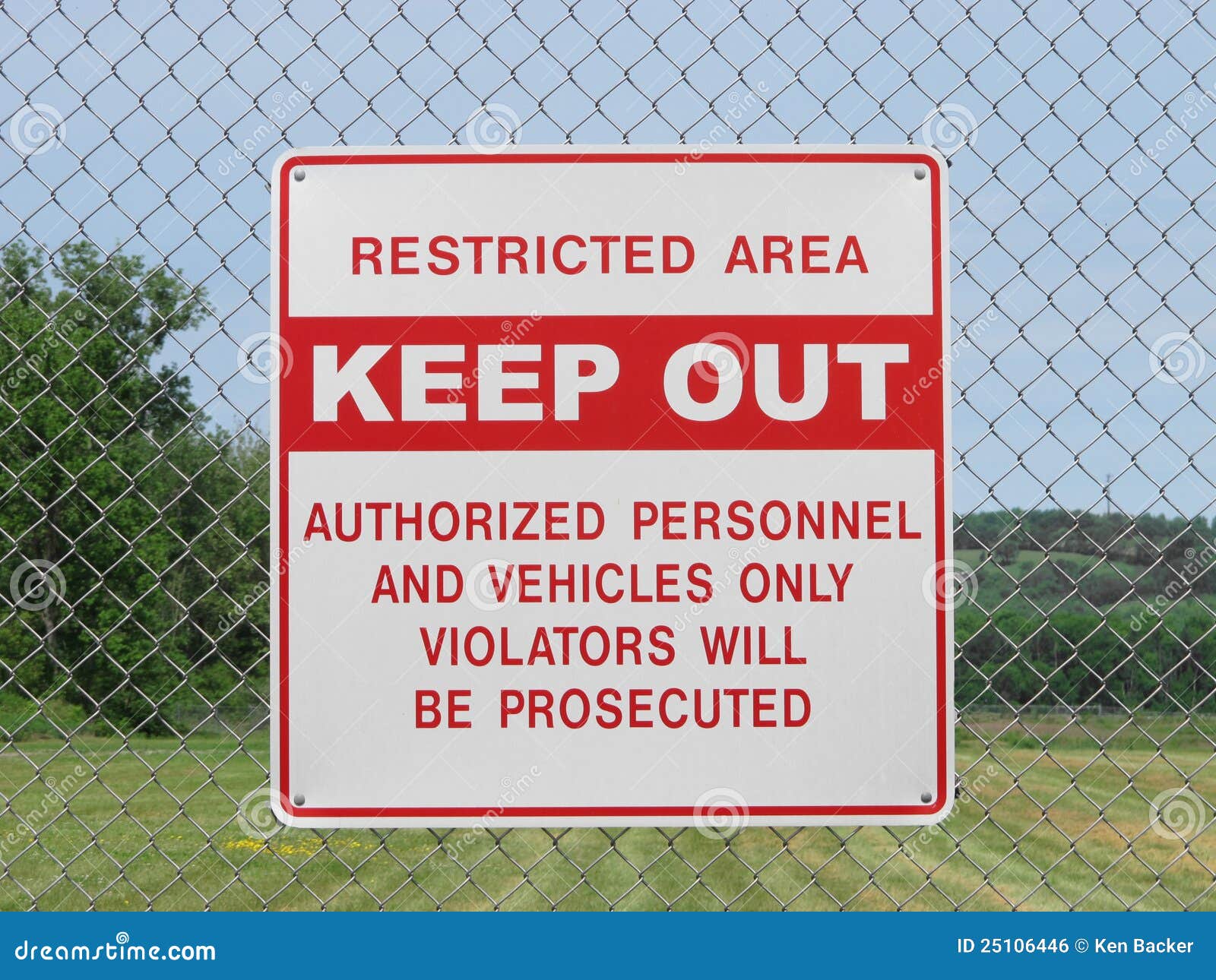 Keep Out Sign On Fence