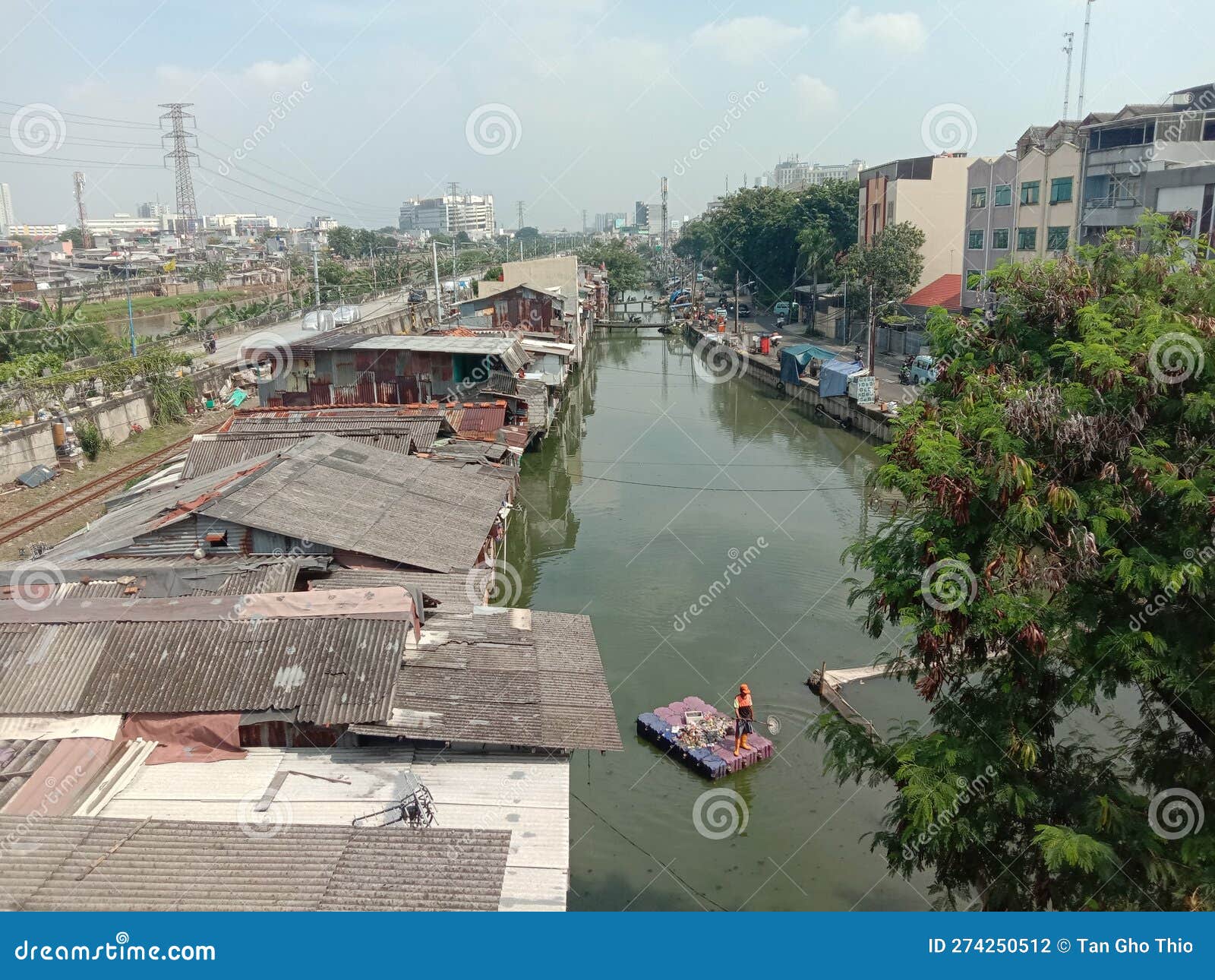 Cleaning the river stock photo. Image of river, city - 274250512