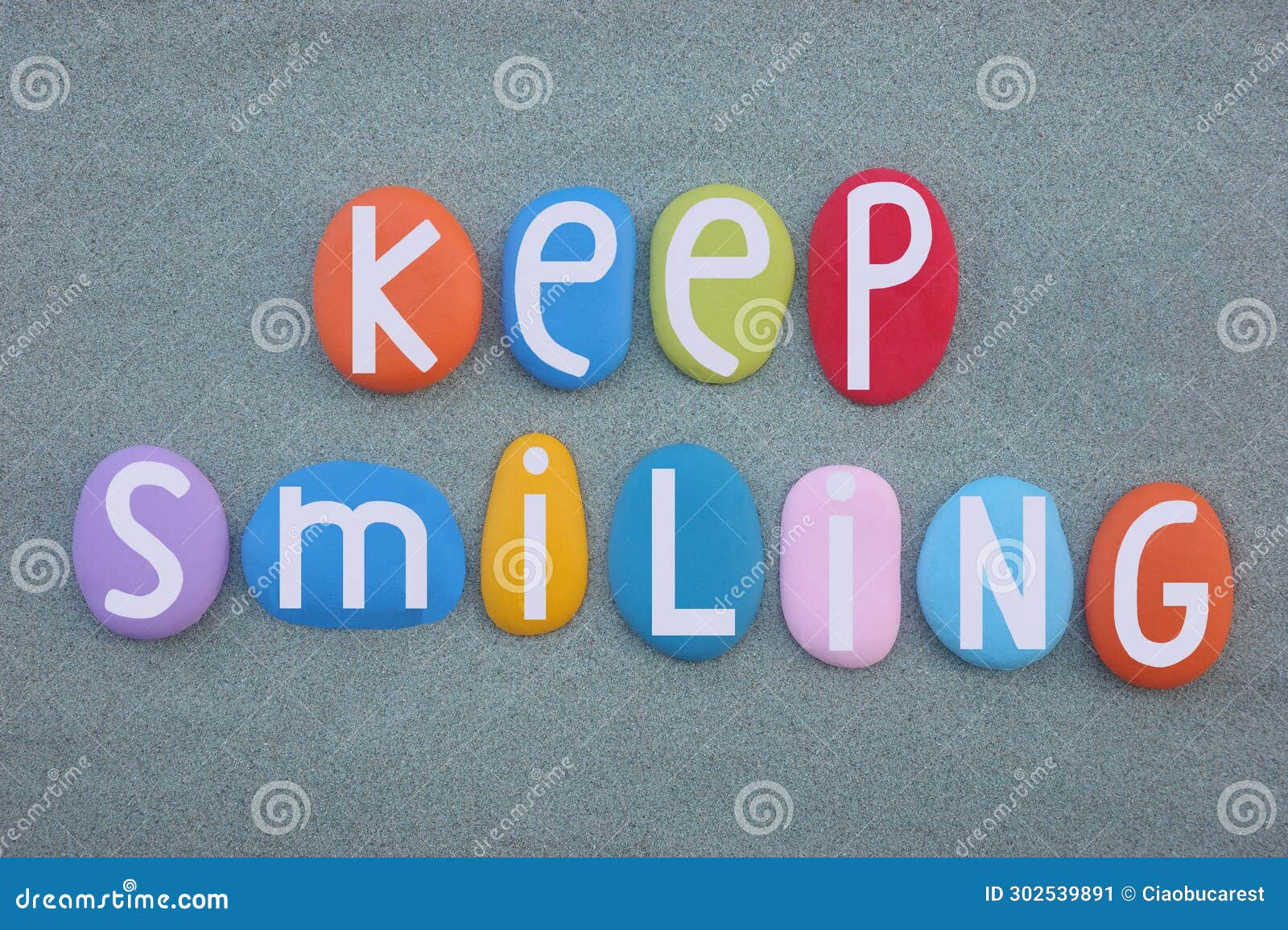 Keep Smiling, Creative Social Slogan Composed with Multi Colored Stone ...