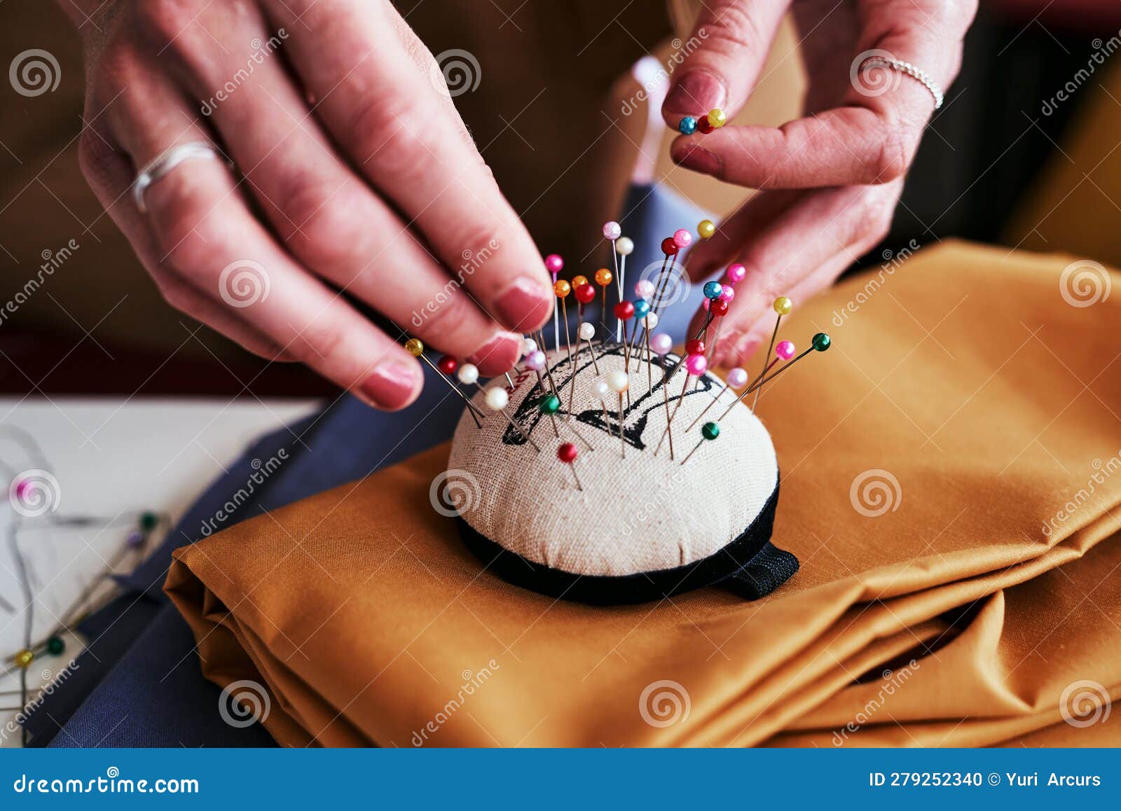 Keep Your Pins Organized. an Unrecognizable Designer Using a Pincushion ...