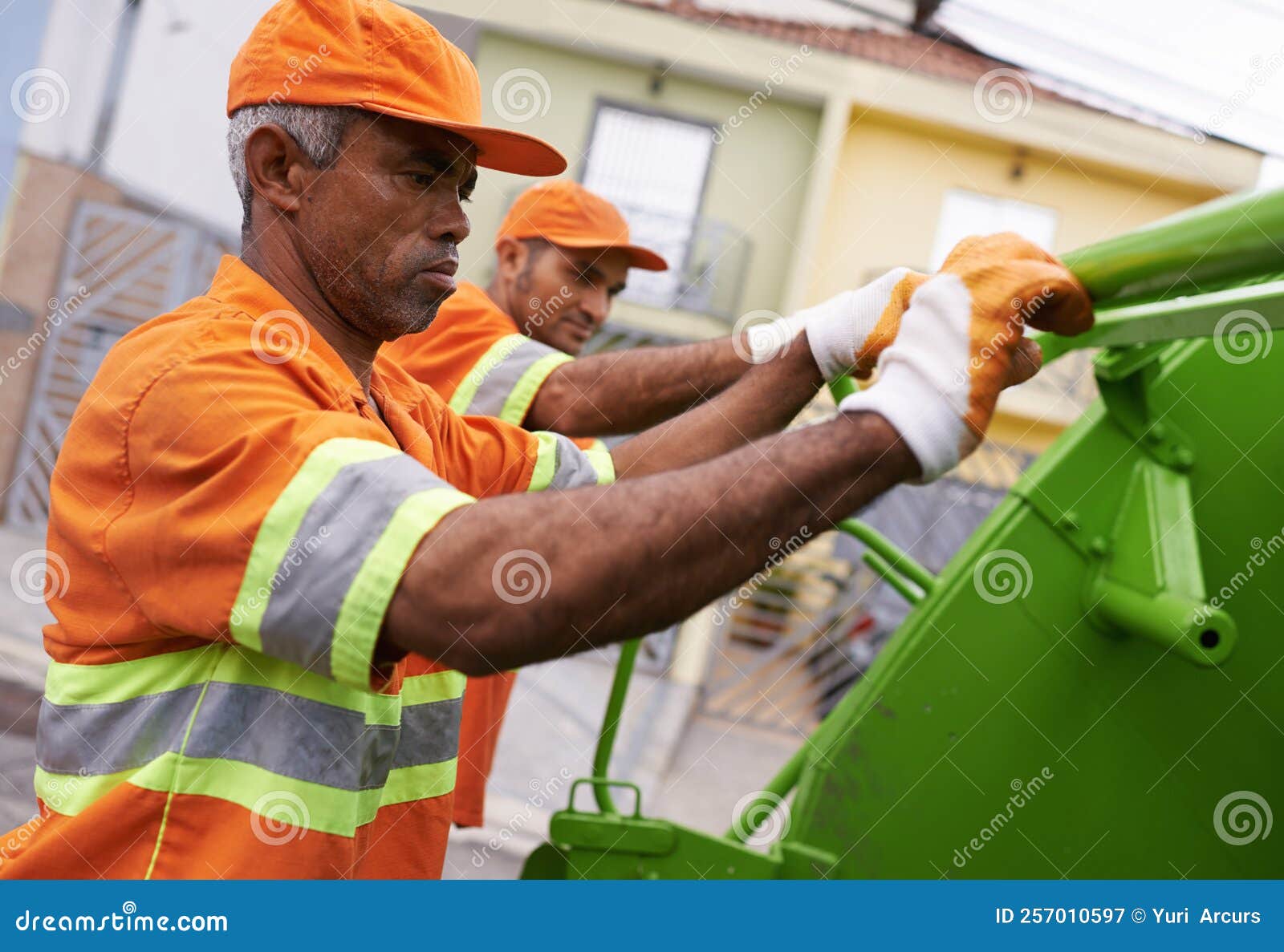 Keeping the City Clean. a Team of Garbage Collectors. Stock Image ...