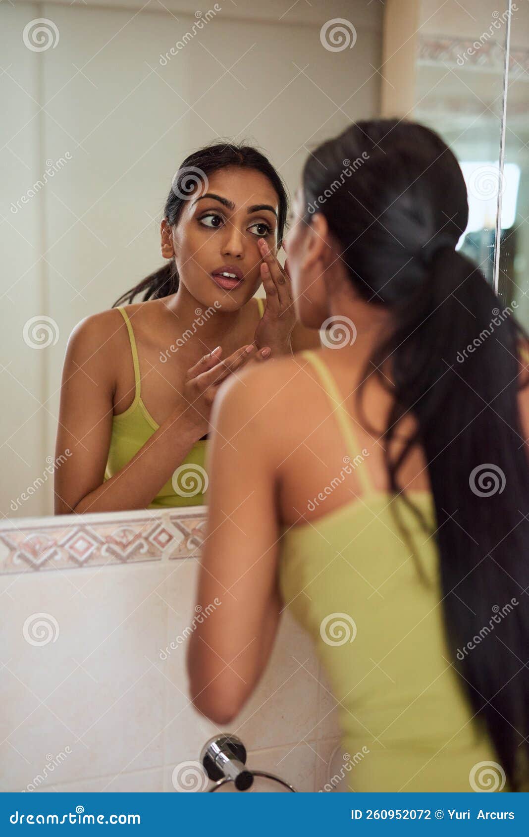 Keeping a Close Eye for Any Blemishes. a Young Woman Looking at Her ... Keeping a Close Eye for Any Blemishes. a Young Woman Looking at Her ...