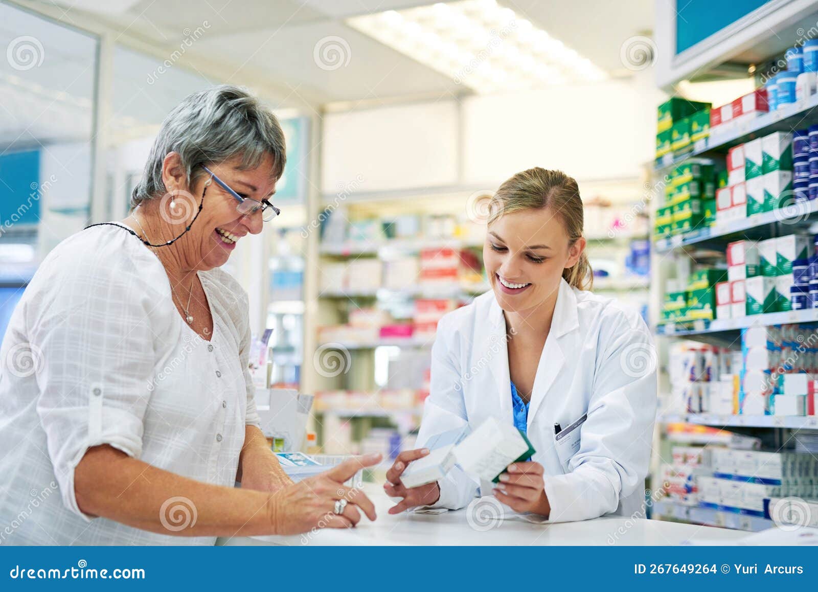 Keeping Her Customer Well Informed about Her Medication. a Young ...