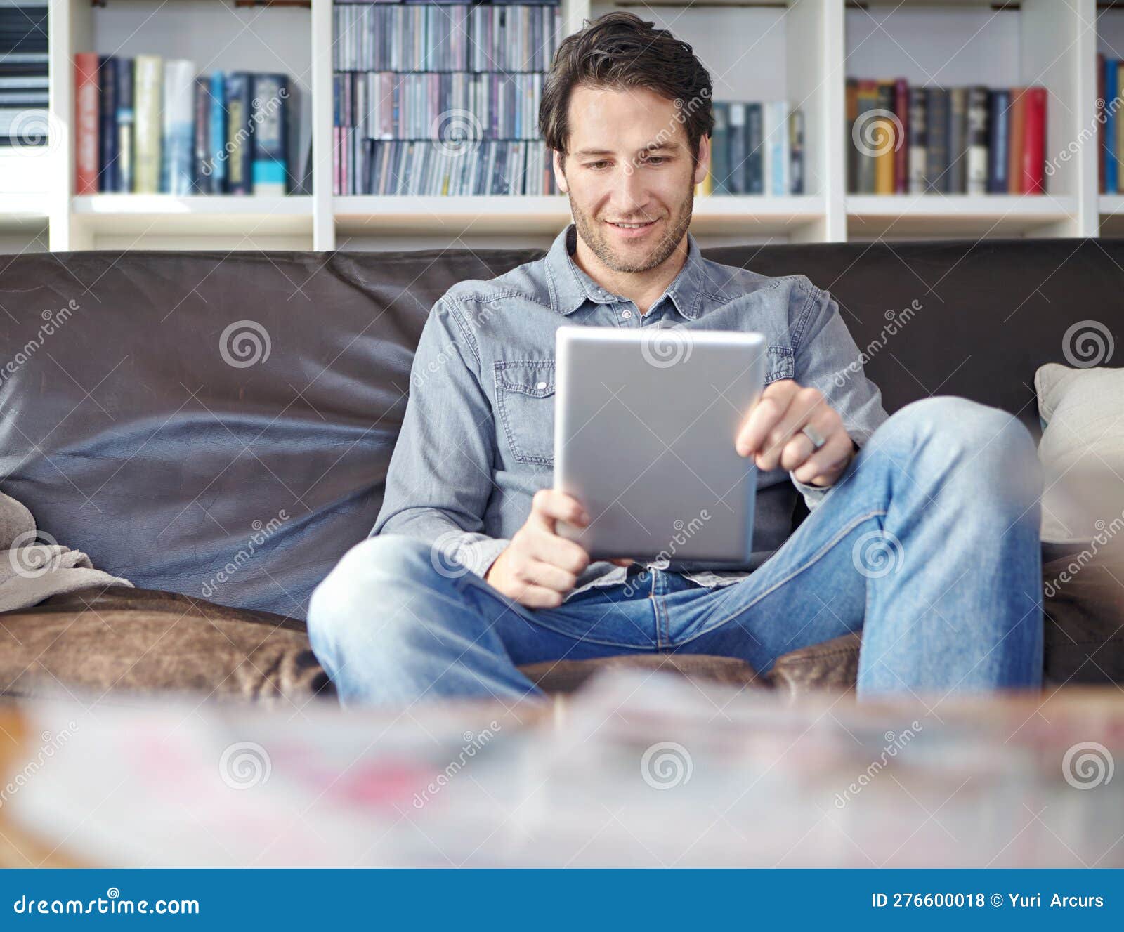 Keeping Himself Entertained on the Weekend. a Handsome Young Man ...