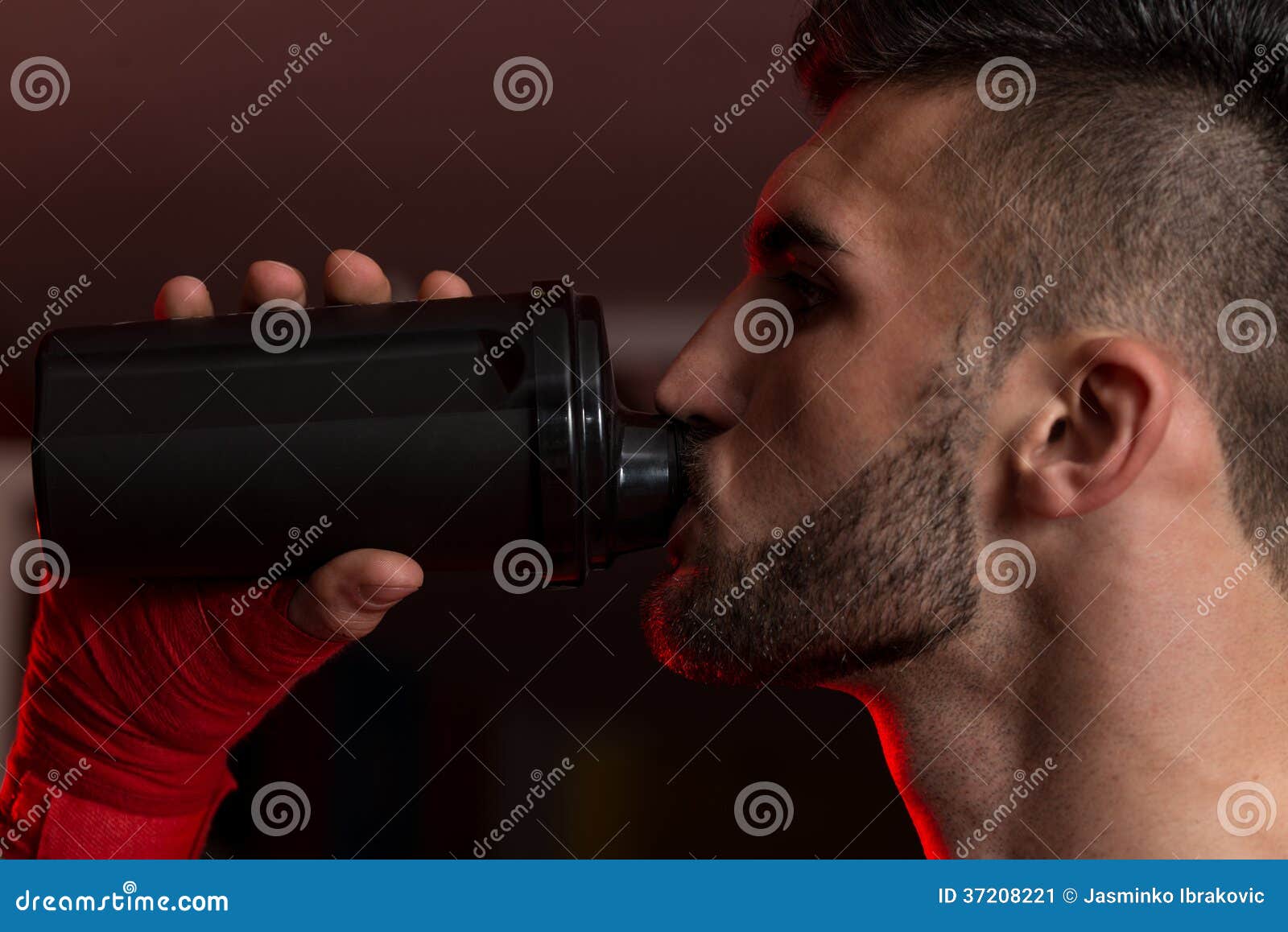 Keeping Himself Hydrated stock image. Image of adults - 37208221