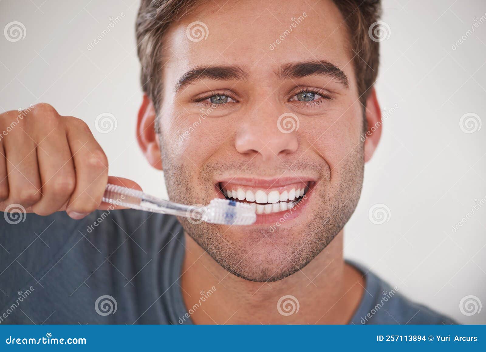 Keeping His Teeth Sparkly White. a Man Brushing His Teeth. Stock Photo ...