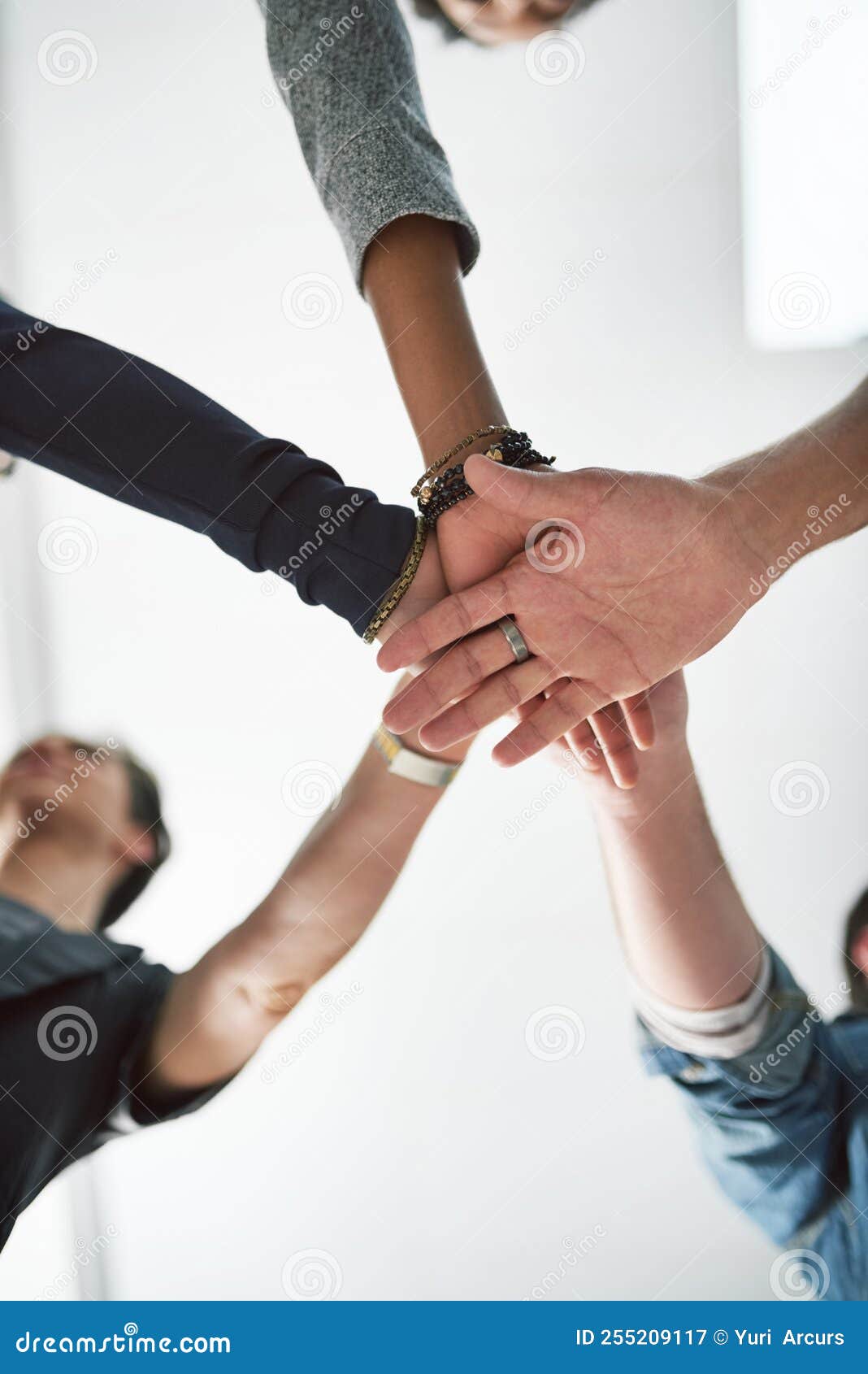 Keeping Their Unity Alive. a Group of People Stacking Their Hands on ...
