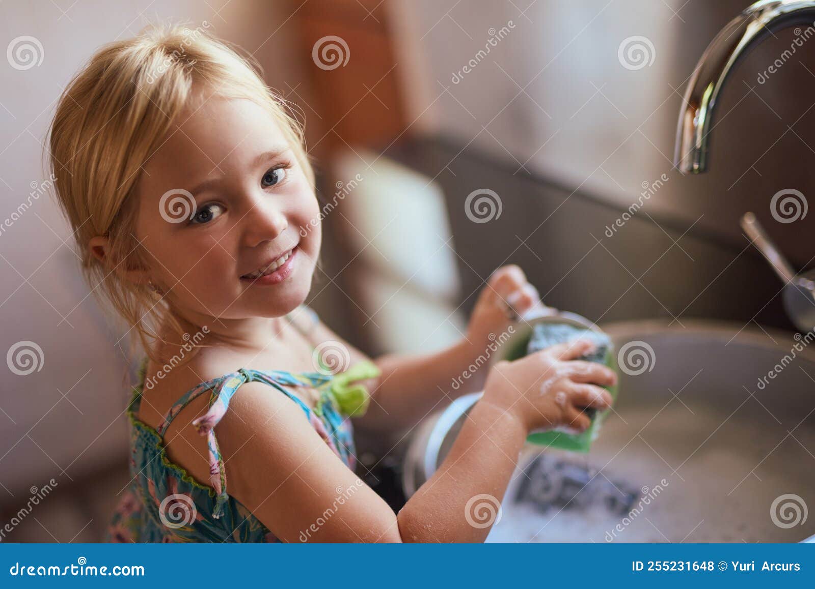 Keeping Things Clean. Portrait of a Little Girl Washing Dishes at Home ... Keeping Things Clean. Portrait of a Little Girl Washing Dishes at Home ...