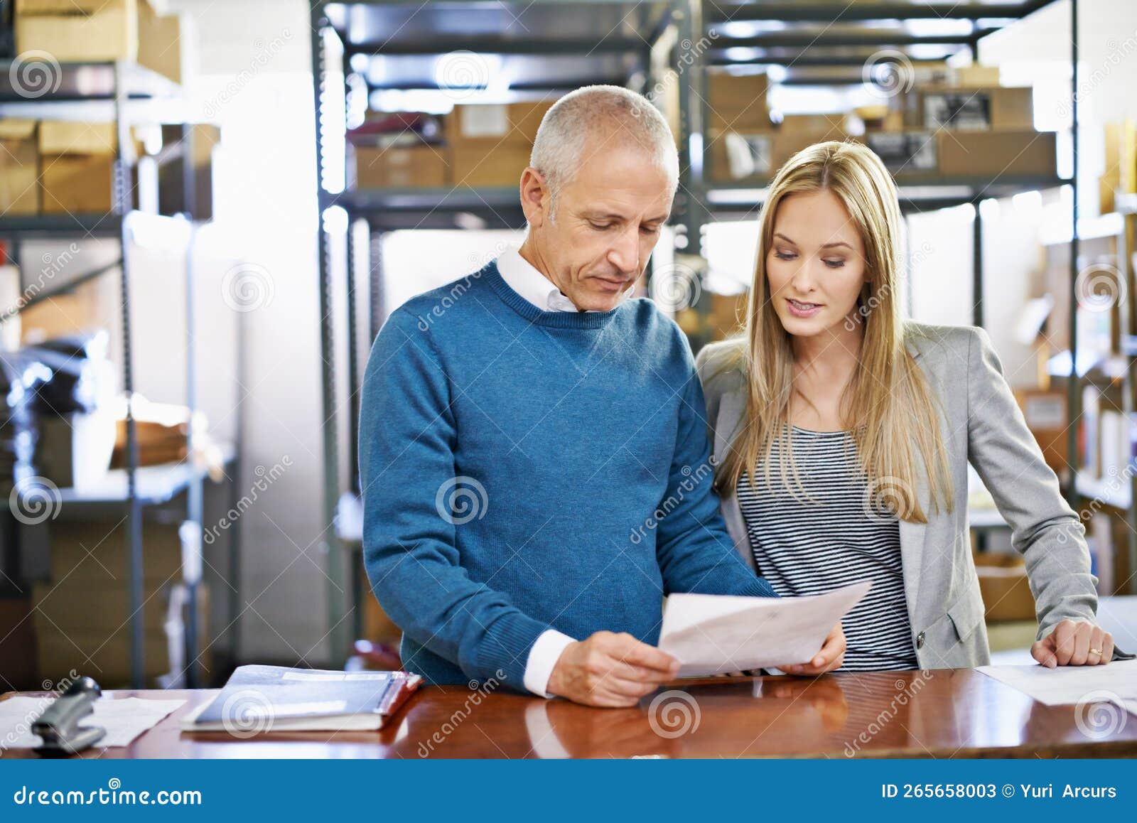 Keeping the Warehouse Functioning. a Two Managers Looking through ...