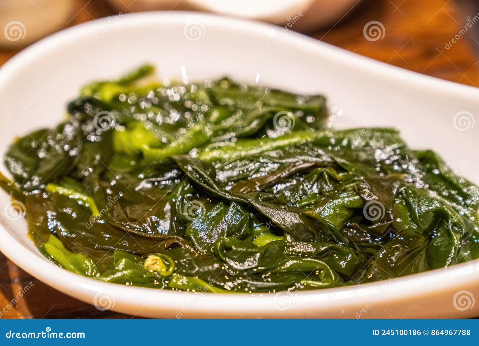 Fresh Kelp Bulb With Seaweed Strands On Beach Stock Image ...