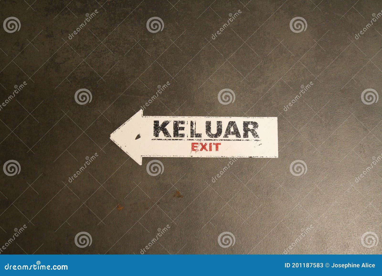 Keluar / Exit Sign on Black Wall Stock Image - Image of wood, design ...