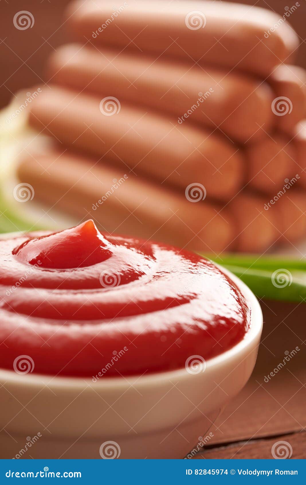 Ketchup and Sausage on a White Plate Stock Photo - Image of tomato ...