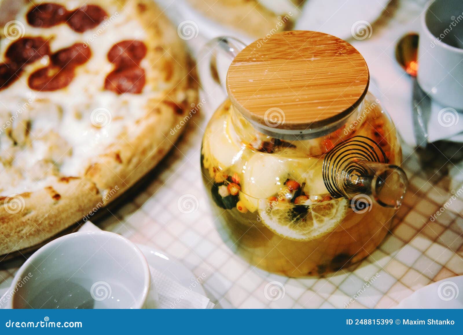 Kettle with Fruit Tea and Pizza on the Table in the Cafe Stock Image ...