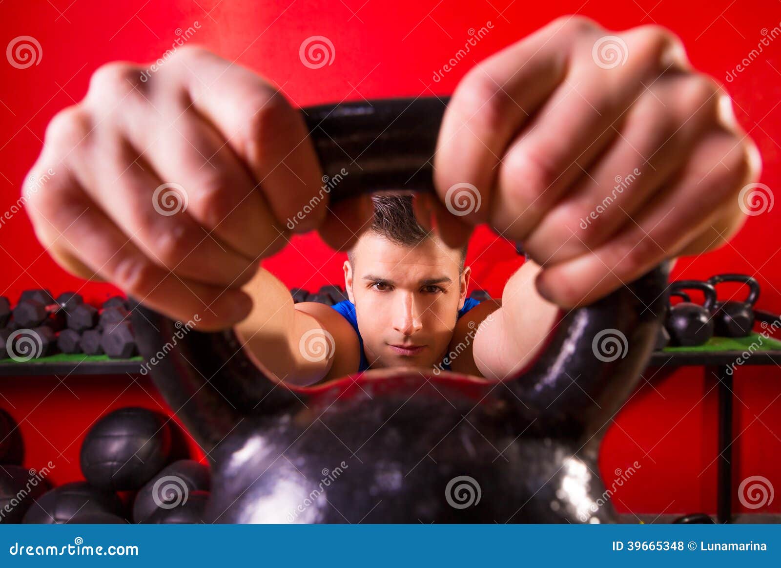 Kettlebell Man Portrait Looking through the Handle Stock Photo - Image ...